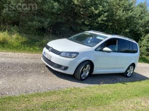 White Volkswagen Touran 2015 in Ogre, with an engine capacity of 2.00 L and mileage of 285 thousand km for 7200 €, photo 4 on AUTOMOTO.COM.LV