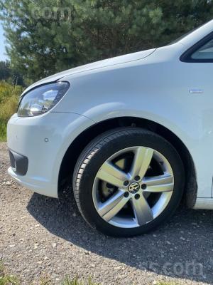 White Volkswagen Touran 2015 in Ogre, with an engine capacity of 2.00 L and mileage of 285 thousand km for 7200 €, photo 7 on AUTOMOTO.COM.LV