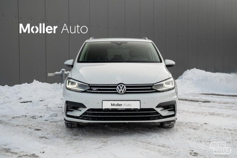 White Volkswagen Touran 2016 in Vilnius, with an engine capacity of 1.80 L and mileage of 142 thousand km for 12300 €, photo 2 on AUTOMOTO.COM.LV