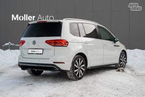 White Volkswagen Touran 2016 in Vilnius, with an engine capacity of 1.80 L and mileage of 142 thousand km for 12300 €, photo 6 on AUTOMOTO.COM.LV