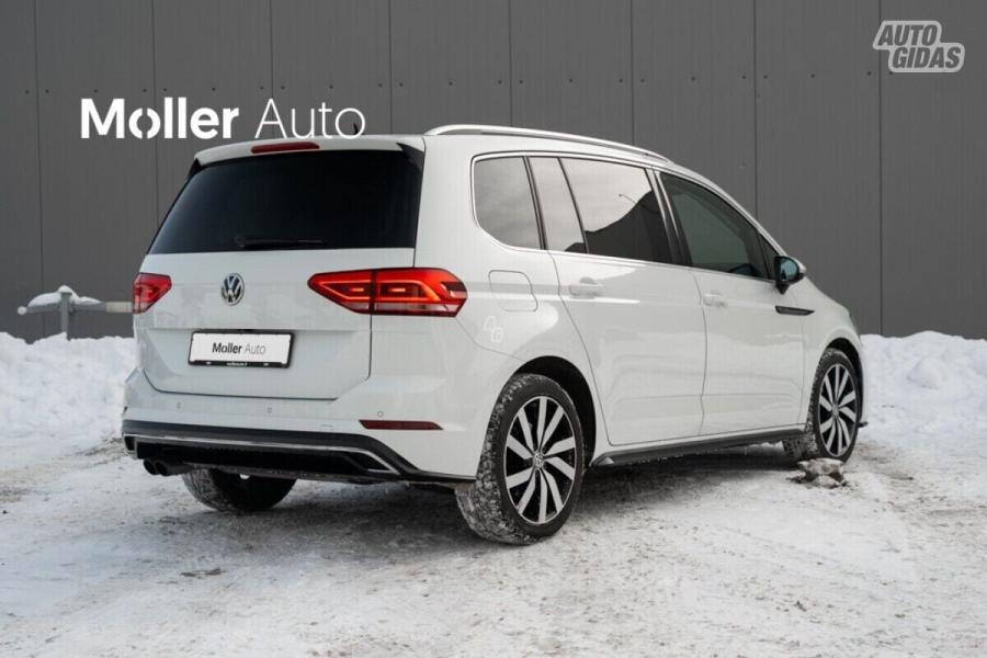 White Volkswagen Touran 2016 in Vilnius, with an engine capacity of 1.80 L and mileage of 142 thousand km for 12300 €, photo 6 on AUTOMOTO.COM.LV