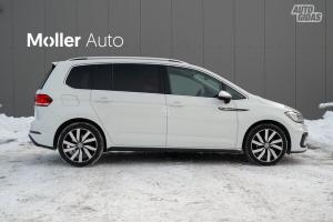 White Volkswagen Touran 2016 in Vilnius, with an engine capacity of 1.80 L and mileage of 142 thousand km for 12300 €, photo 7 on AUTOMOTO.COM.LV