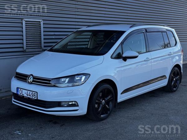 White Volkswagen Touran 2016 in Riga, with an engine capacity of 2.00 L and mileage of 226 thousand km for 8400 €, photo 1 on AUTOMOTO.COM.LV