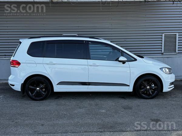 White Volkswagen Touran 2016 in Riga, with an engine capacity of 2.00 L and mileage of 226 thousand km for 8400 €, photo 6 on AUTOMOTO.COM.LV