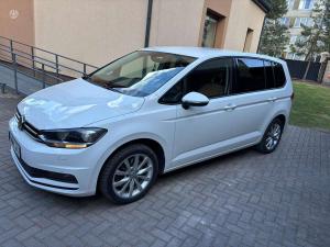 White Volkswagen Touran 2016 in Siauliai, with an engine capacity of 2.00 L and mileage of 289 thousand km for 9800 €, photo 4 on AUTOMOTO.COM.LV