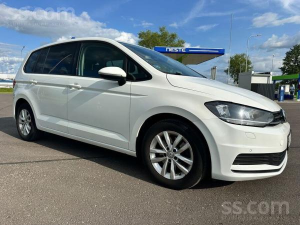 White Volkswagen Touran 2017 in Daugavpils, with an engine capacity of 1.40 L and mileage of 232 thousand km for 9100 €, photo 4 on AUTOMOTO.COM.LV