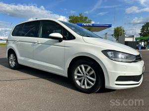 White Volkswagen Touran 2017 in Daugavpils, with an engine capacity of 1.40 L and mileage of 232 thousand km for 9100 €, photo 4 on AUTOMOTO.COM.LV