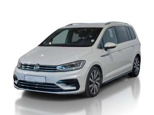 White Volkswagen Touran 2017 in Kaunas, with an engine capacity of 1.40 L and mileage of 65 thousand km for 28529 €, photo  on AUTOMOTO.COM.LV