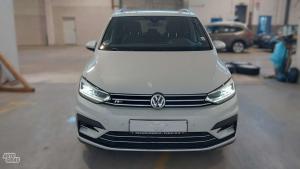 White Volkswagen Touran 2017 in Kaunas, with an engine capacity of 1.40 L and mileage of 65 thousand km for 28529 €, photo 2 on AUTOMOTO.COM.LV