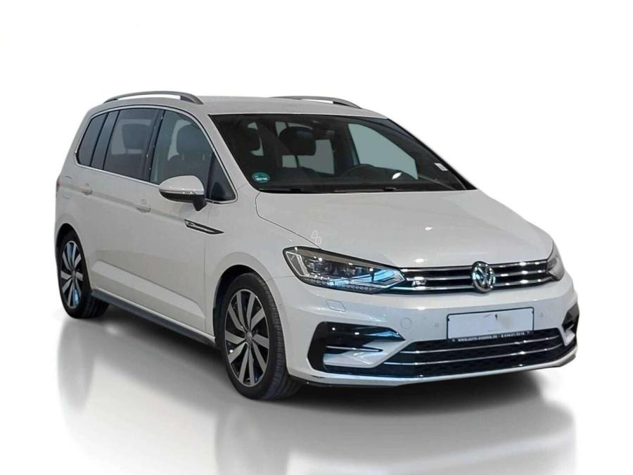 White Volkswagen Touran 2017 in Kaunas, with an engine capacity of 1.40 L and mileage of 65 thousand km for 28529 €, photo 3 on AUTOMOTO.COM.LV