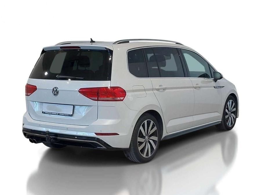 White Volkswagen Touran 2017 in Kaunas, with an engine capacity of 1.40 L and mileage of 65 thousand km for 28529 €, photo 4 on AUTOMOTO.COM.LV