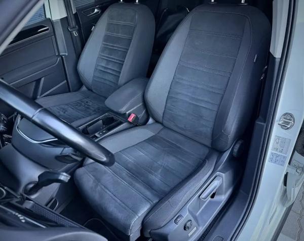 White Volkswagen Touran 2017 in Riga, with an engine capacity of 2.00 L and mileage of 197 thousand km for 17295 €, photo 9 on AUTOMOTO.COM.LV