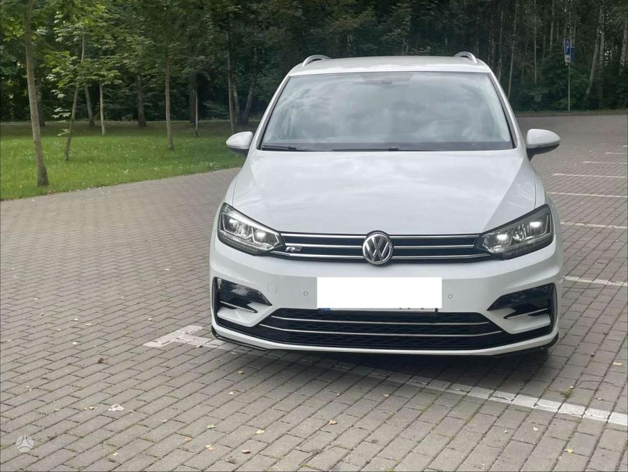 White Volkswagen Touran 2017 in Panevezys, with an engine capacity of 2.00 L and mileage of 284 thousand km for 12000 €, photo 3 on AUTOMOTO.COM.LV