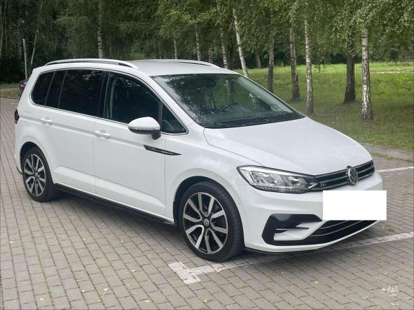 White Volkswagen Touran 2017 in Panevezys, with an engine capacity of 2.00 L and mileage of 284 thousand km for 12000 €, photo 4 on AUTOMOTO.COM.LV
