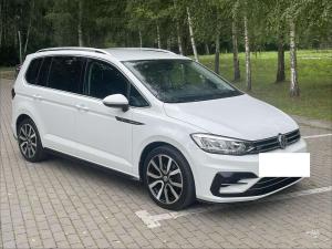 White Volkswagen Touran 2017 in Panevezys, with an engine capacity of 2.00 L and mileage of 284 thousand km for 12000 €, photo 4 on AUTOMOTO.COM.LV