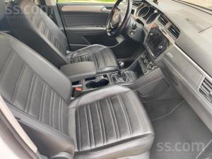 White Volkswagen Touran 2018 in Riga, with an engine capacity of 1.60 L and mileage of 310 thousand km for 9700 €, photo 4 on AUTOMOTO.COM.LV