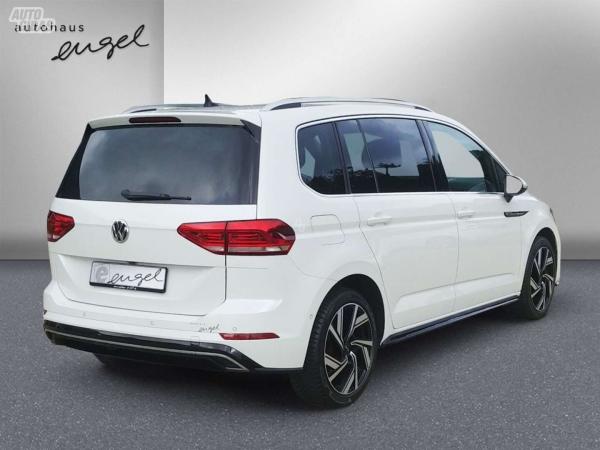 White Volkswagen Touran 2020 in Kaunas, with an engine capacity of 1.50 L and mileage of 47 thousand km for 31097 €, photo 5 on AUTOMOTO.COM.LV