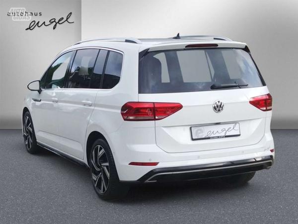 White Volkswagen Touran 2020 in Kaunas, with an engine capacity of 1.50 L and mileage of 47 thousand km for 31097 €, photo 6 on AUTOMOTO.COM.LV