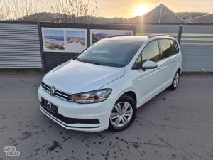 White Volkswagen Touran 2020 in Kaunas, with an engine capacity of 1.50 L and mileage of 58 thousand km for 22399 €, photo  on AUTOMOTO.COM.LV