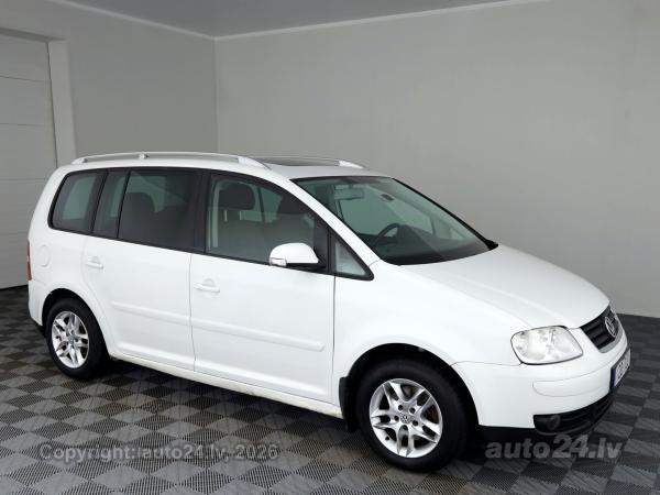 Balts Volkswagen Touran 2006 Tallina, ar dzinēja tilpumu 2.00 L un nobraukumu 355 tūkst. km par 999 €, foto 1 vietnē AUTOMOTO.COM.LV