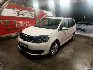 White Volkswagen Touran 2012 in Kaunas, with an engine capacity of 1.40 L and mileage of 324 thousand km for 2400 €, photo 2 on AUTOMOTO.COM.LV