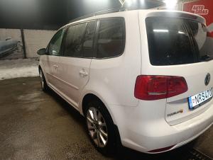 White Volkswagen Touran 2012 in Kaunas, with an engine capacity of 1.40 L and mileage of 324 thousand km for 2400 €, photo 6 on AUTOMOTO.COM.LV