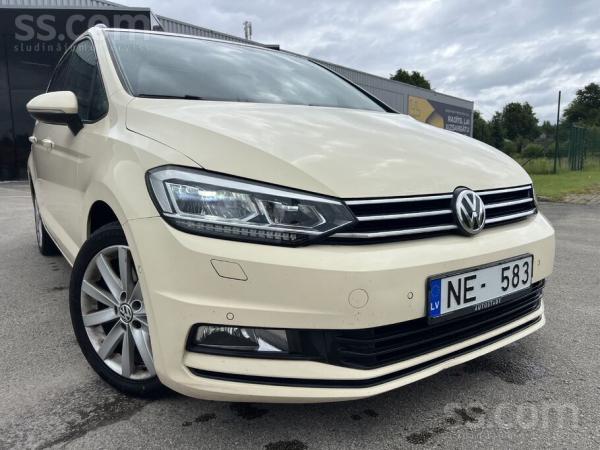 Dzeltens Volkswagen Touran 2016 Rīga, ar dzinēja tilpumu 2.00 L un nobraukumu 316 tūkst. km par 6990 €, foto 1 vietnē AUTOMOTO.COM.LV