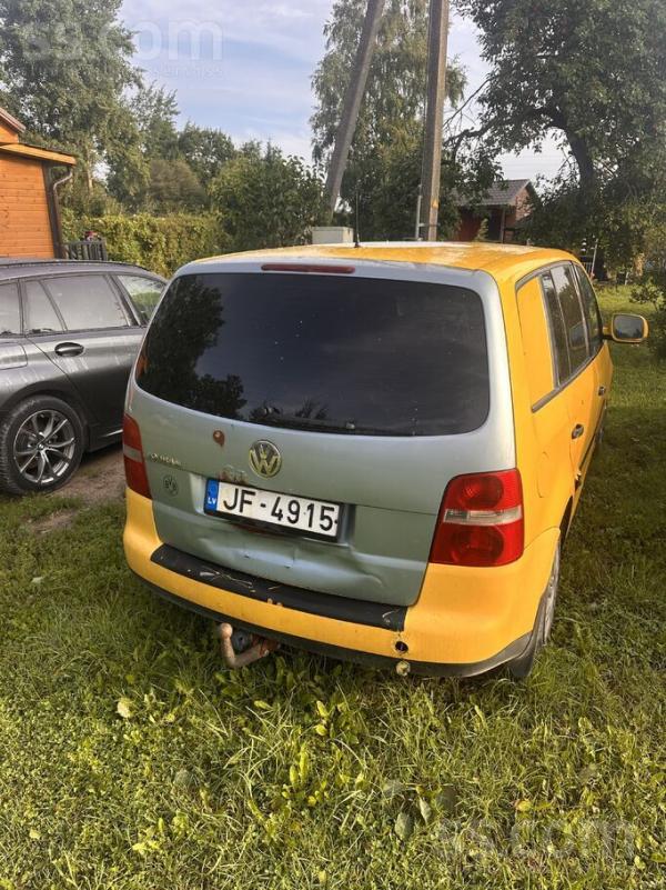 Volkswagen Touran 2004 RÄ«ga vietnÄ Dzeltens Volkswagen Touran 2004 RÄ«ga, ar dzinÄja tilpumu 1.90 L un nobraukumu 556 tÅ«kst. km par 605 ā¬, foto 3 vietnÄ AUTOMOTO.COM.LV