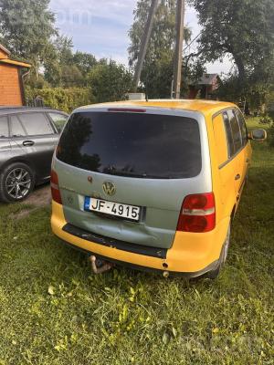 Yellow Volkswagen Touran 2004 in Riga, with an engine capacity of 1.90 L and mileage of 556 thousand km for 605 €, photo 3 on AUTOMOTO.COM.LV