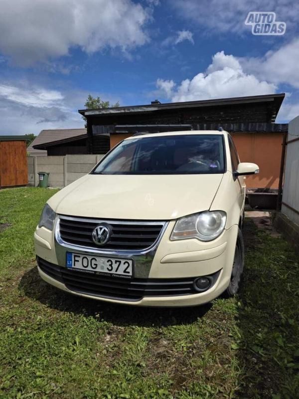 Dzeltens Volkswagen Touran 2007 Kauņa, ar dzinēja tilpumu 1.90 L un nobraukumu 400 tūkst. km par 800 €, foto 1 vietnē AUTOMOTO.COM.LV