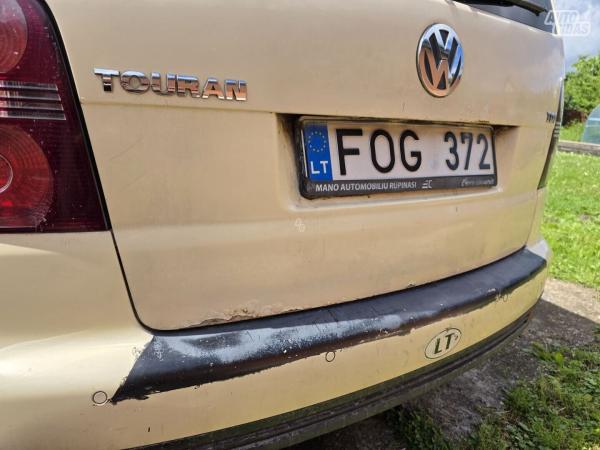Dzeltens Volkswagen Touran 2007 Kauņa, ar dzinēja tilpumu 1.90 L un nobraukumu 400 tūkst. km par 800 €, foto 6 vietnē AUTOMOTO.COM.LV