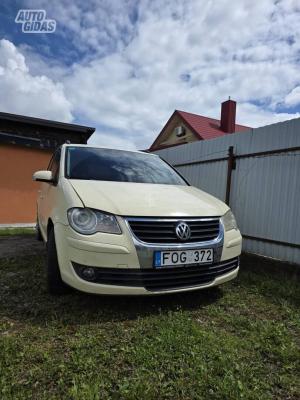 Yellow Volkswagen Touran 2007 in Kaunas, with an engine capacity of 1.90 L and mileage of 400 thousand km for 800 €, photo 12 on AUTOMOTO.COM.LV