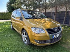 Yellow Volkswagen Touran 2007 in Silute, with an engine capacity of 1.90 L and mileage of 286 thousand km for 2250 €, photo  on AUTOMOTO.COM.LV