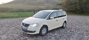 Yellow Volkswagen Touran 2007 in Druskininkai, with an engine capacity of 1.90 L and mileage of 342 thousand km for 800 €, photo  on AUTOMOTO.COM.LV