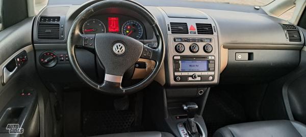 Yellow Volkswagen Touran 2007 in Druskininkai, with an engine capacity of 1.90 L and mileage of 342 thousand km for 800 €, photo 11 on AUTOMOTO.COM.LV