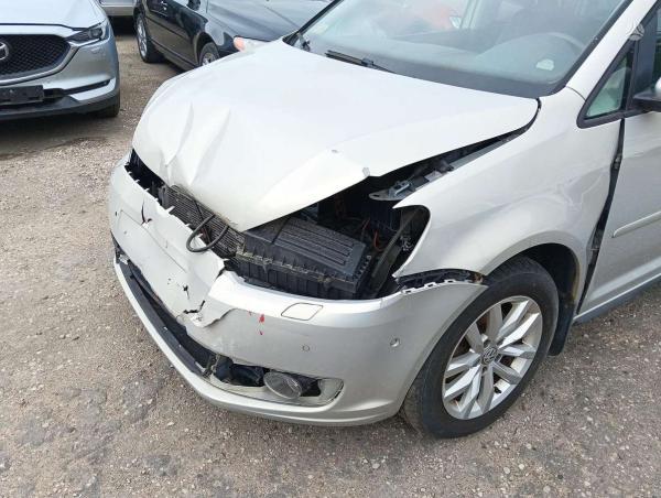 Dzeltens Volkswagen Touran 2011 Marijampole, ar dzinēja tilpumu 1.60 L un nobraukumu 333 tūkst. km par 2300 €, foto 4 vietnē AUTOMOTO.COM.LV