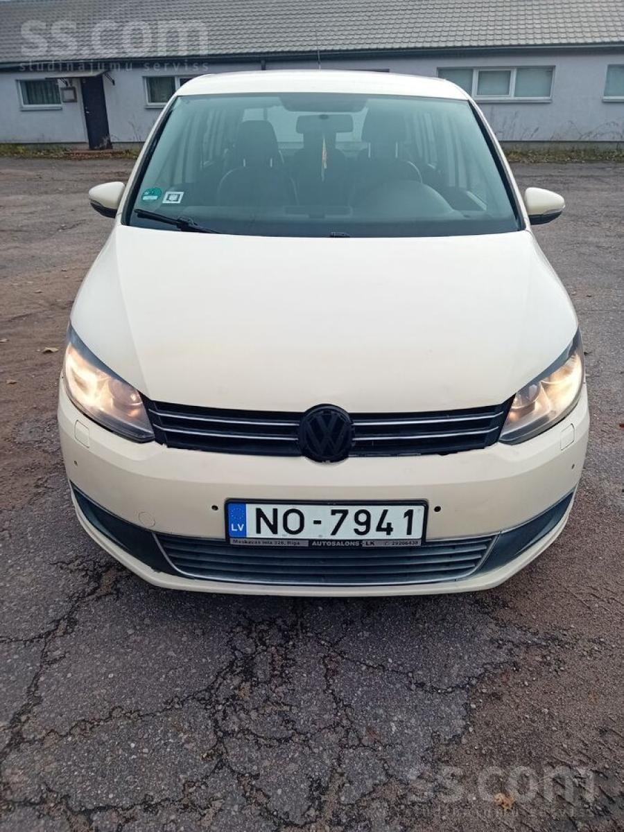 Yellow Volkswagen Touran 2012 in Daugavpils, with an engine capacity of 1.60 L and mileage of 616 thousand km for 1850 €, photo 1 on AUTOMOTO.COM.LV