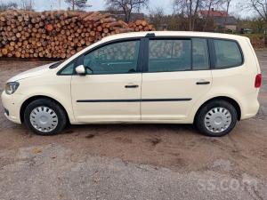 Yellow Volkswagen Touran 2012 in Daugavpils, with an engine capacity of 1.60 L and mileage of 616 thousand km for 1850 €, photo 10 on AUTOMOTO.COM.LV