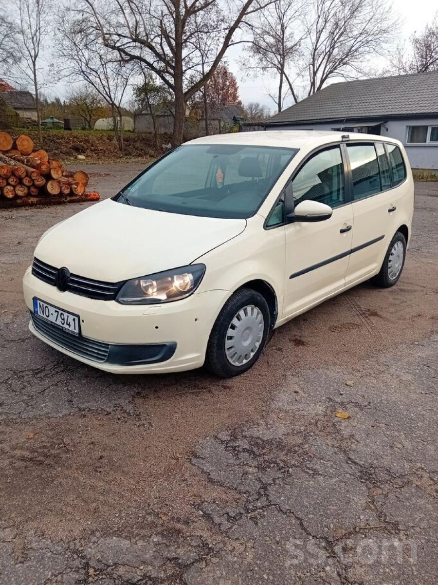 Yellow Volkswagen Touran 2012 in Daugavpils, with an engine capacity of 1.60 L and mileage of 616 thousand km for 1850 €, photo 11 on AUTOMOTO.COM.LV