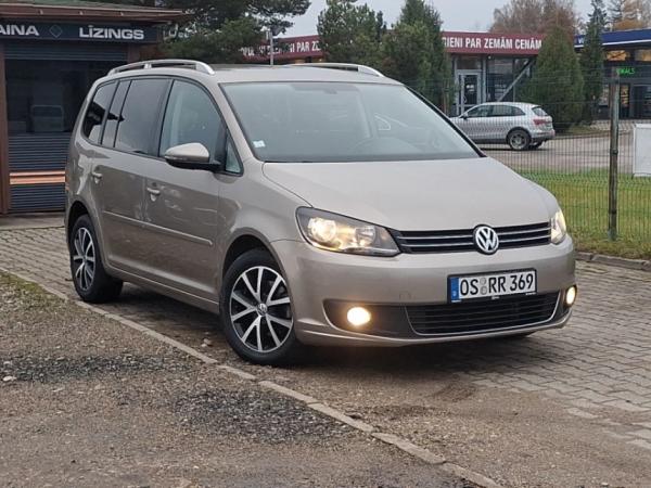 Dzeltens Volkswagen Touran 2012 Rīga, ar dzinēja tilpumu 1.60 L un nobraukumu 239 tūkst. km par 6777 €, foto 1 vietnē AUTOMOTO.COM.LV