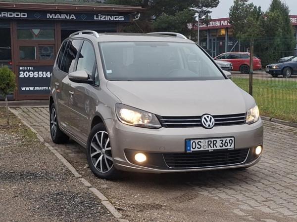 Dzeltens Volkswagen Touran 2012 Rīga, ar dzinēja tilpumu 1.60 L un nobraukumu 239 tūkst. km par 6777 €, foto 2 vietnē AUTOMOTO.COM.LV