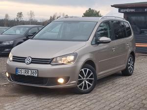 Yellow Volkswagen Touran 2012 in Riga, with an engine capacity of 1.60 L and mileage of 239 thousand km for 6777 €, photo 5 on AUTOMOTO.COM.LV