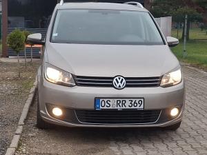 Yellow Volkswagen Touran 2012 in Riga, with an engine capacity of 1.60 L and mileage of 239 thousand km for 6777 €, photo 7 on AUTOMOTO.COM.LV