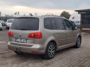Yellow Volkswagen Touran 2012 in Riga, with an engine capacity of 1.60 L and mileage of 239 thousand km for 6777 €, photo 12 on AUTOMOTO.COM.LV