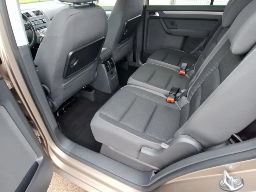 Yellow Volkswagen Touran 2012 in Riga, with an engine capacity of 1.60 L and mileage of 239 thousand km for 6777 €, photo 20 on AUTOMOTO.COM.LV
