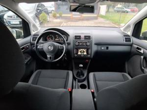Yellow Volkswagen Touran 2012 in Riga, with an engine capacity of 1.60 L and mileage of 239 thousand km for 6777 €, photo 21 on AUTOMOTO.COM.LV
