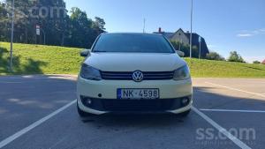 Yellow Volkswagen Touran 2013 in Aluksne, with an engine capacity of 2.00 L and mileage of 0 thousand km for 2800 €, photo 4 on AUTOMOTO.COM.LV