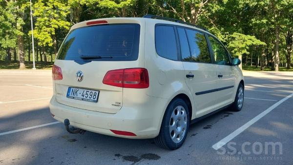 Yellow Volkswagen Touran 2013 in Aluksne, with an engine capacity of 2.00 L and mileage of 0 thousand km for 2800 €, photo 5 on AUTOMOTO.COM.LV