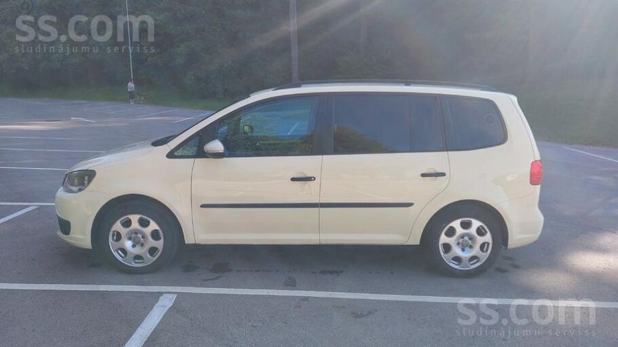 Yellow Volkswagen Touran 2013 in Aluksne, with an engine capacity of 2.00 L and mileage of 0 thousand km for 2800 €, photo 10 on AUTOMOTO.COM.LV