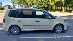 Yellow Volkswagen Touran 2013 in Aluksne, with an engine capacity of 2.00 L and mileage of 0 thousand km for 2800 €, photo 11 on AUTOMOTO.COM.LV
